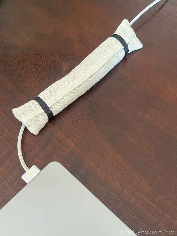 DIY Weighted Cord Holder Using Fabric and Rice – A Pretty Happy Home