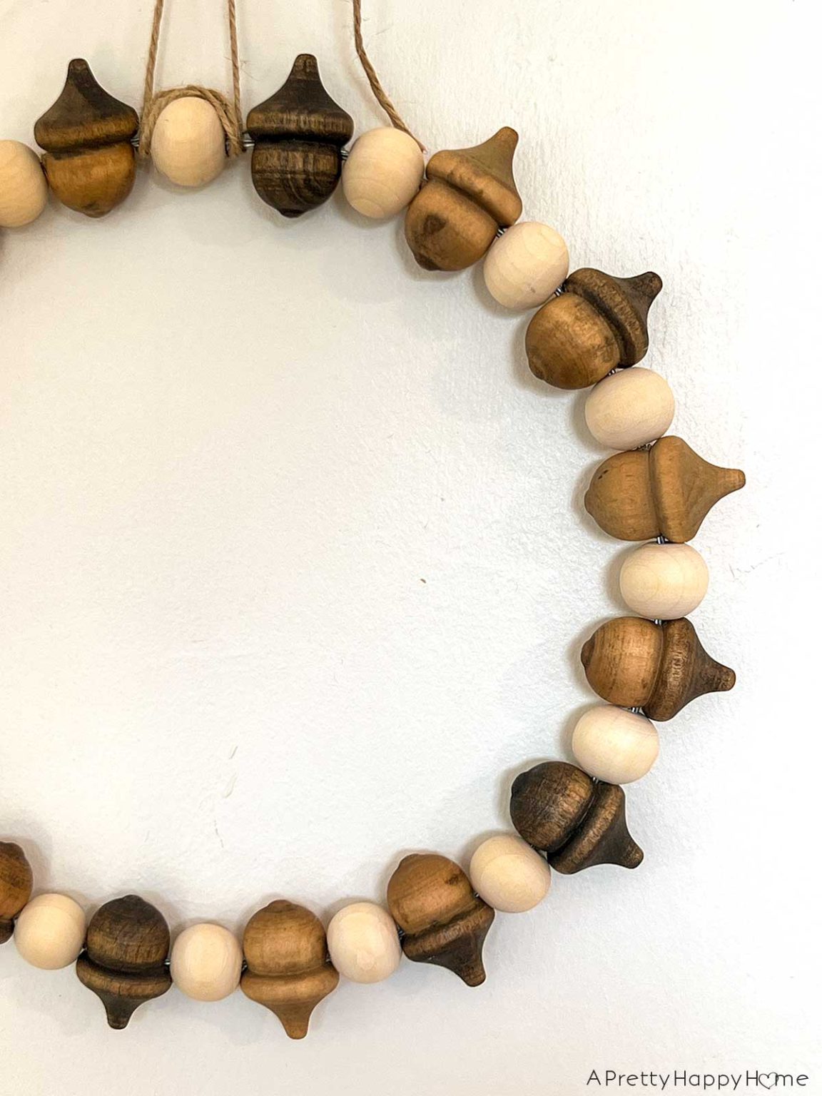DIY Wood Acorn Wreath – A Pretty Happy Home